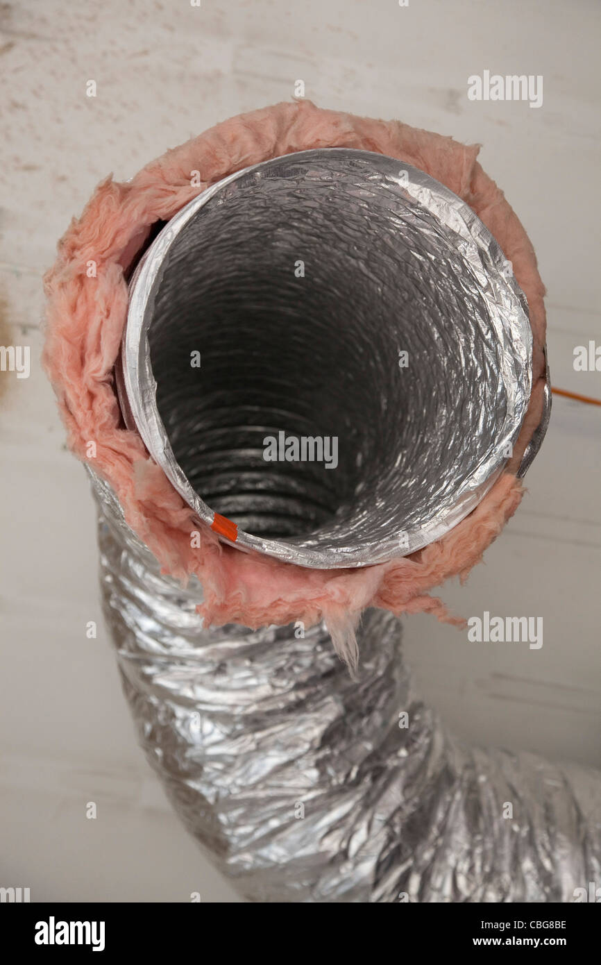 An open air duct pipe with insulation around it Stock Photo - Alamy