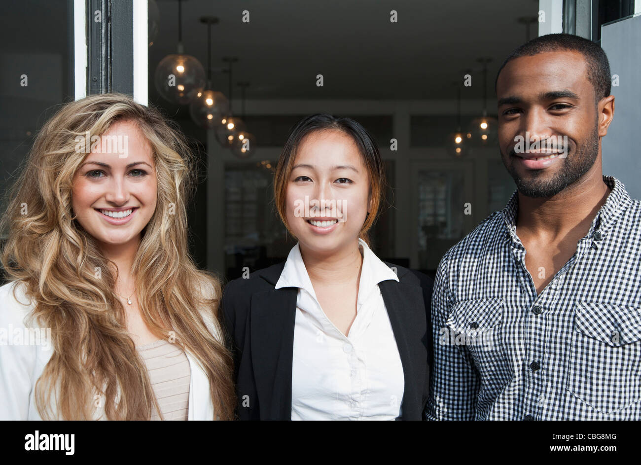Portrait of three colleagues Stock Photo - Alamy