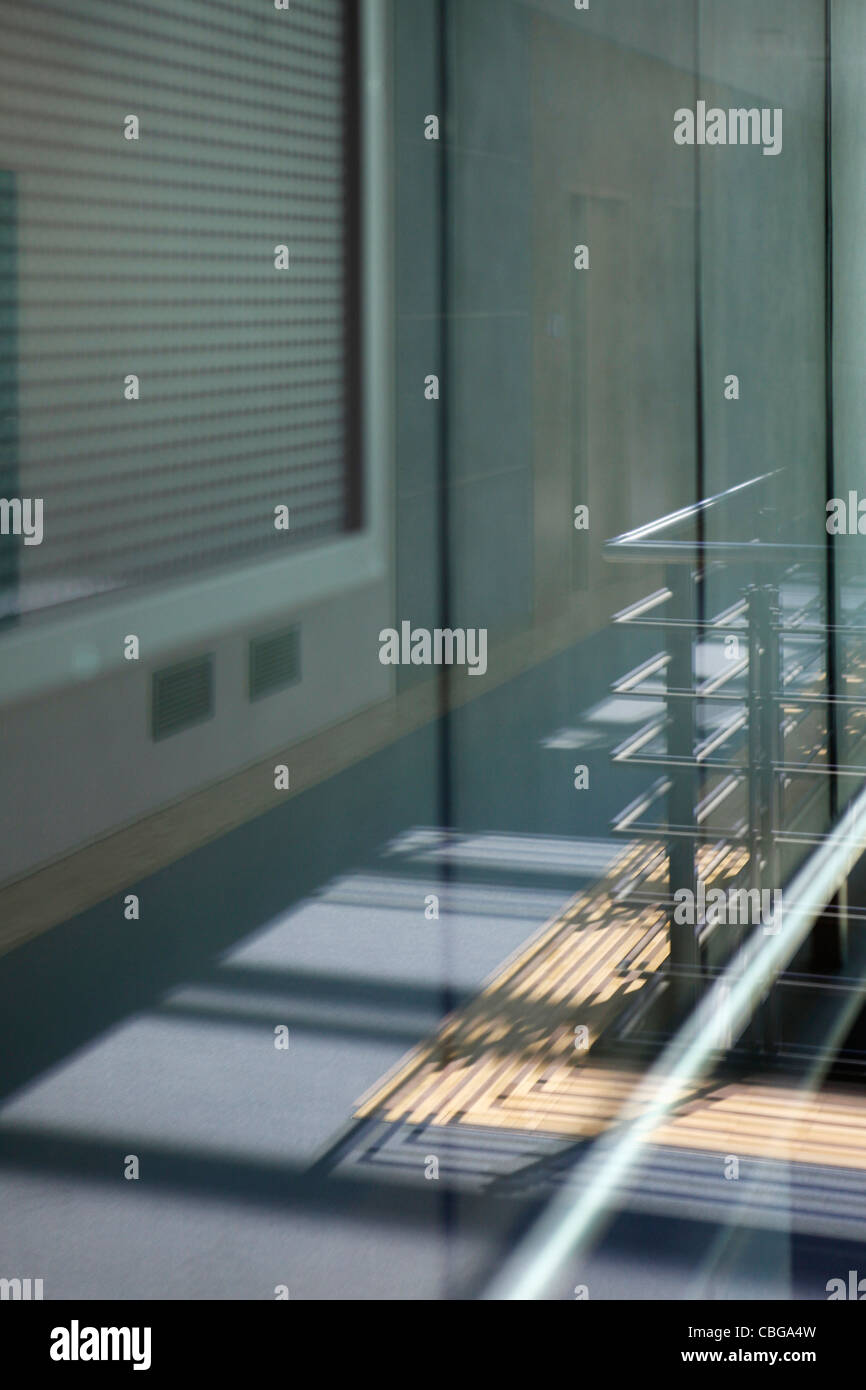 View of building corridor through window Stock Photo - Alamy