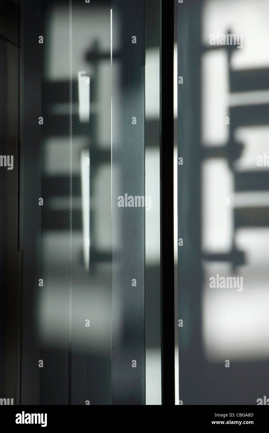 Reflections on glass doors Stock Photo - Alamy