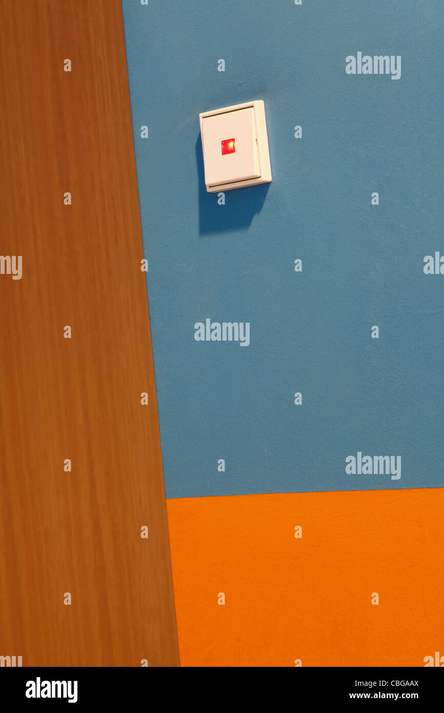 German light switch against a wall Stock Photo - Alamy