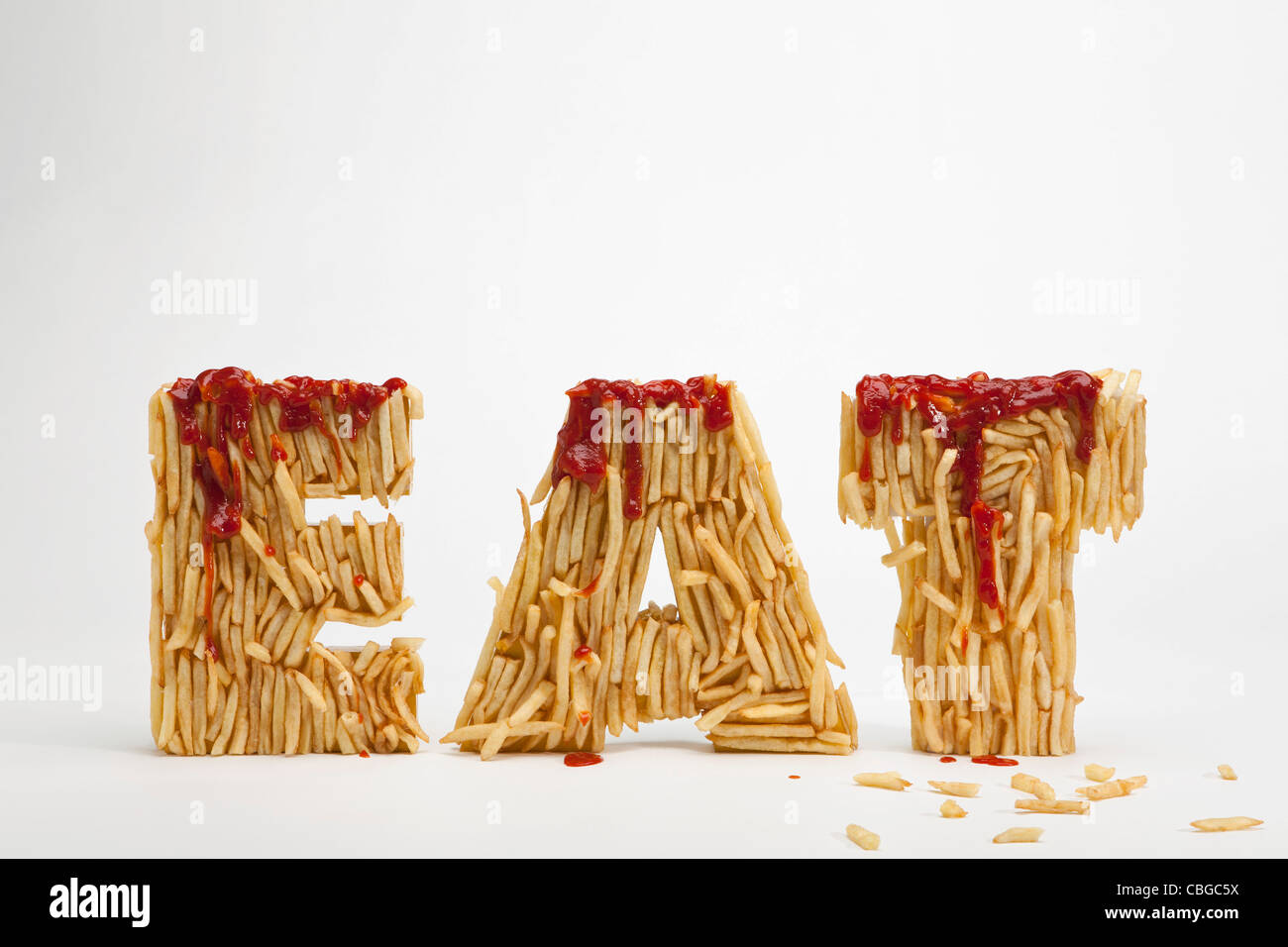 French fries molded to make the word FAT Stock Photo - Alamy