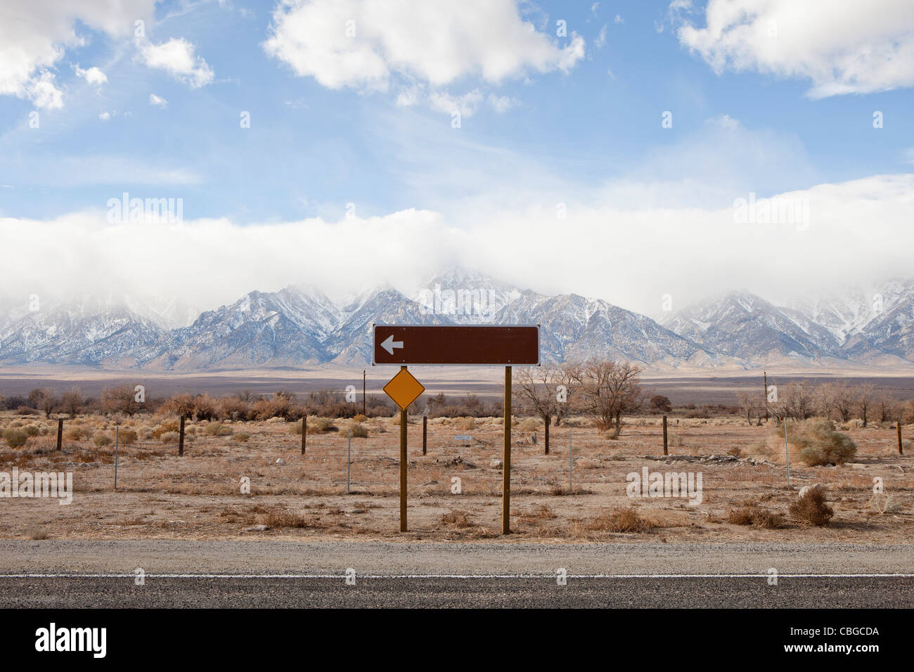 Arrow Sign On Highway at Californian Sierra Nevada Stock Photo - Alamy