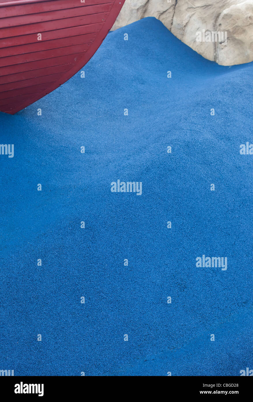 Artificial boat, rock and water Stock Photo - Alamy