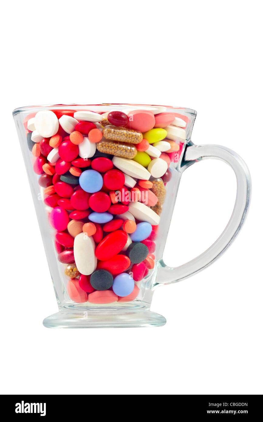 Tablets in the cup Stock Photo - Alamy