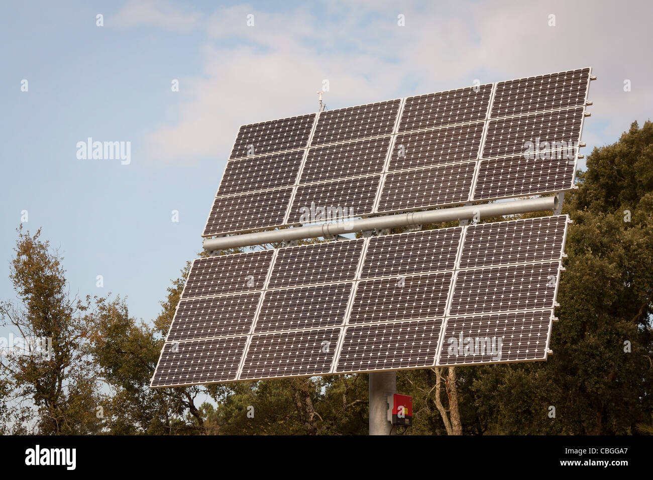 Solar Panel against forest and sky Stock Photo - Alamy