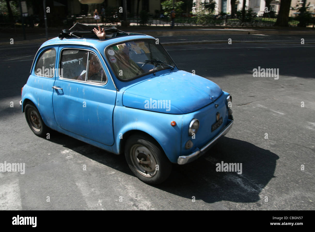 fast old fiat 500 car on street in rome italy Stock Photo - Alamy