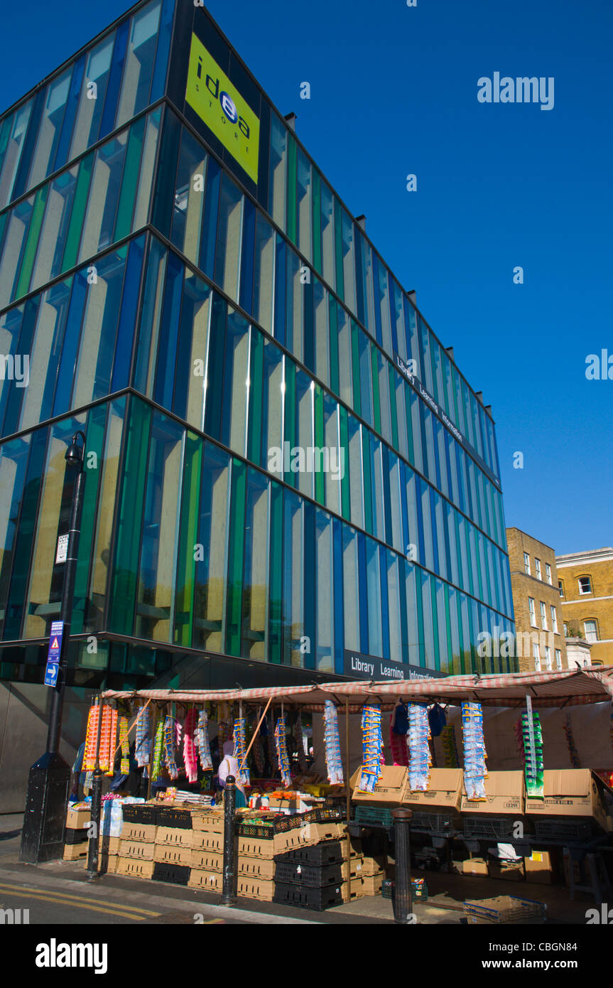 Market stalls in front of recently finished public library building ...