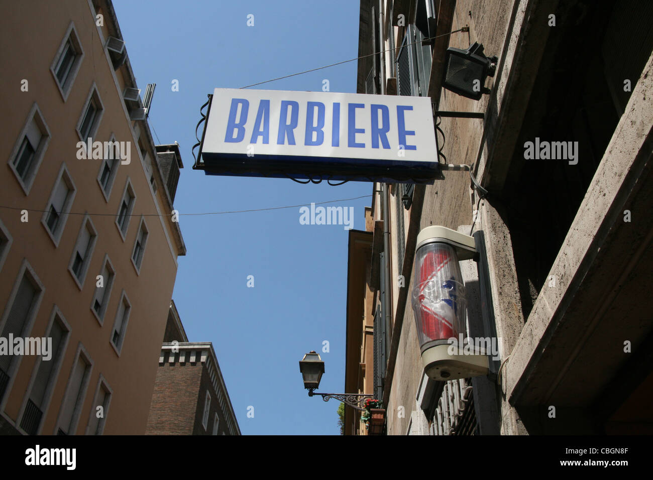 barber shop pole in rome italy Stock Photo - Alamy