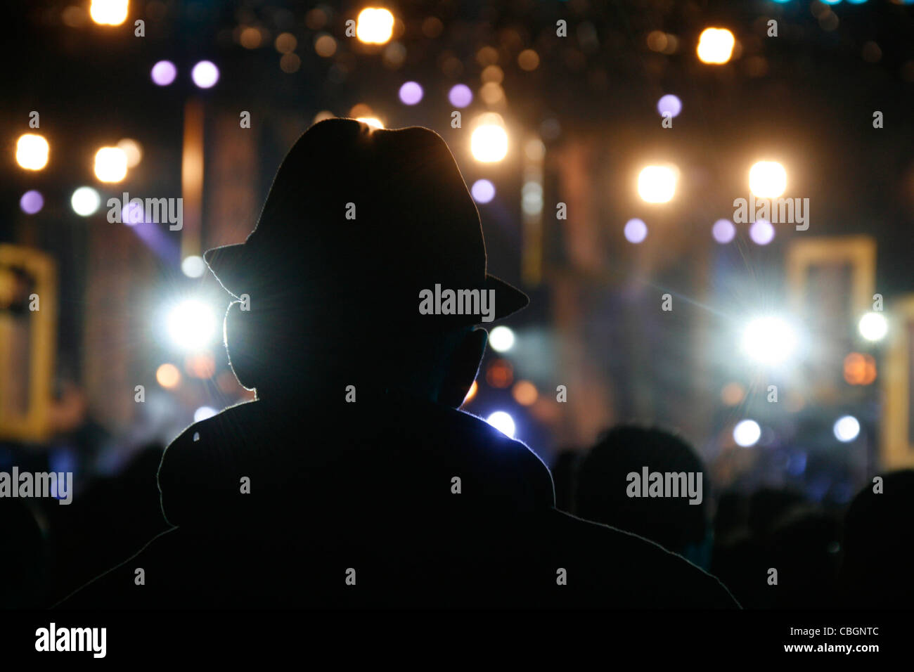 crowd of revellers at music concert gig at night Stock Photo - Alamy