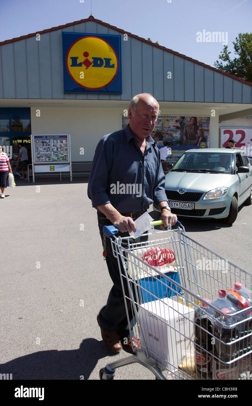Shoppers buying at a budget store Stock Photo - Alamy