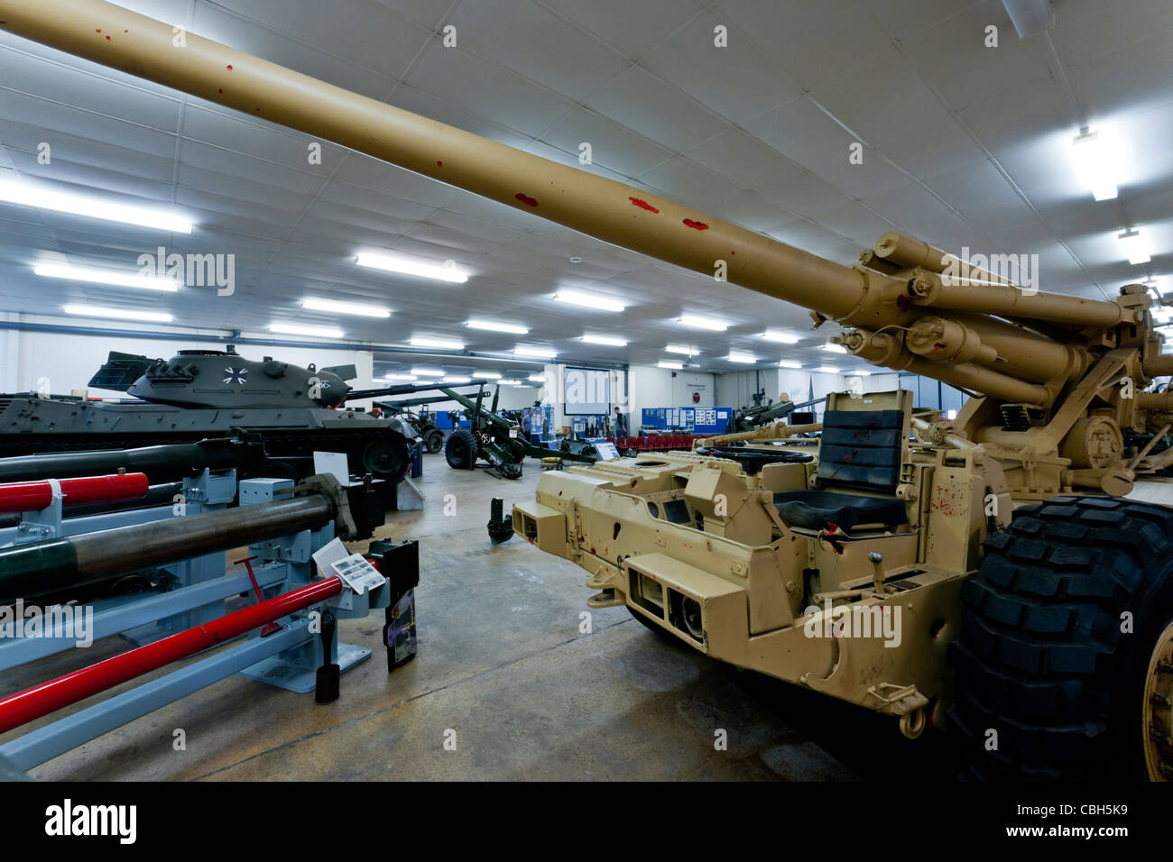 A Leopard Tank and artillery pieces in the British Army's Armour Museum ...
