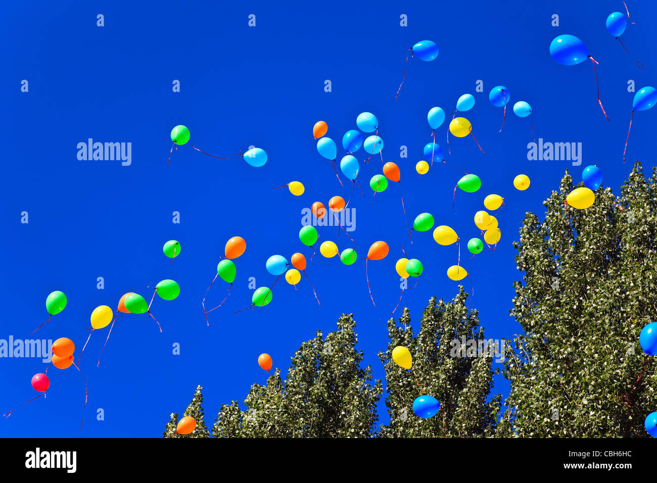Colorful balloons on sky hi-res stock photography and images - Alamy