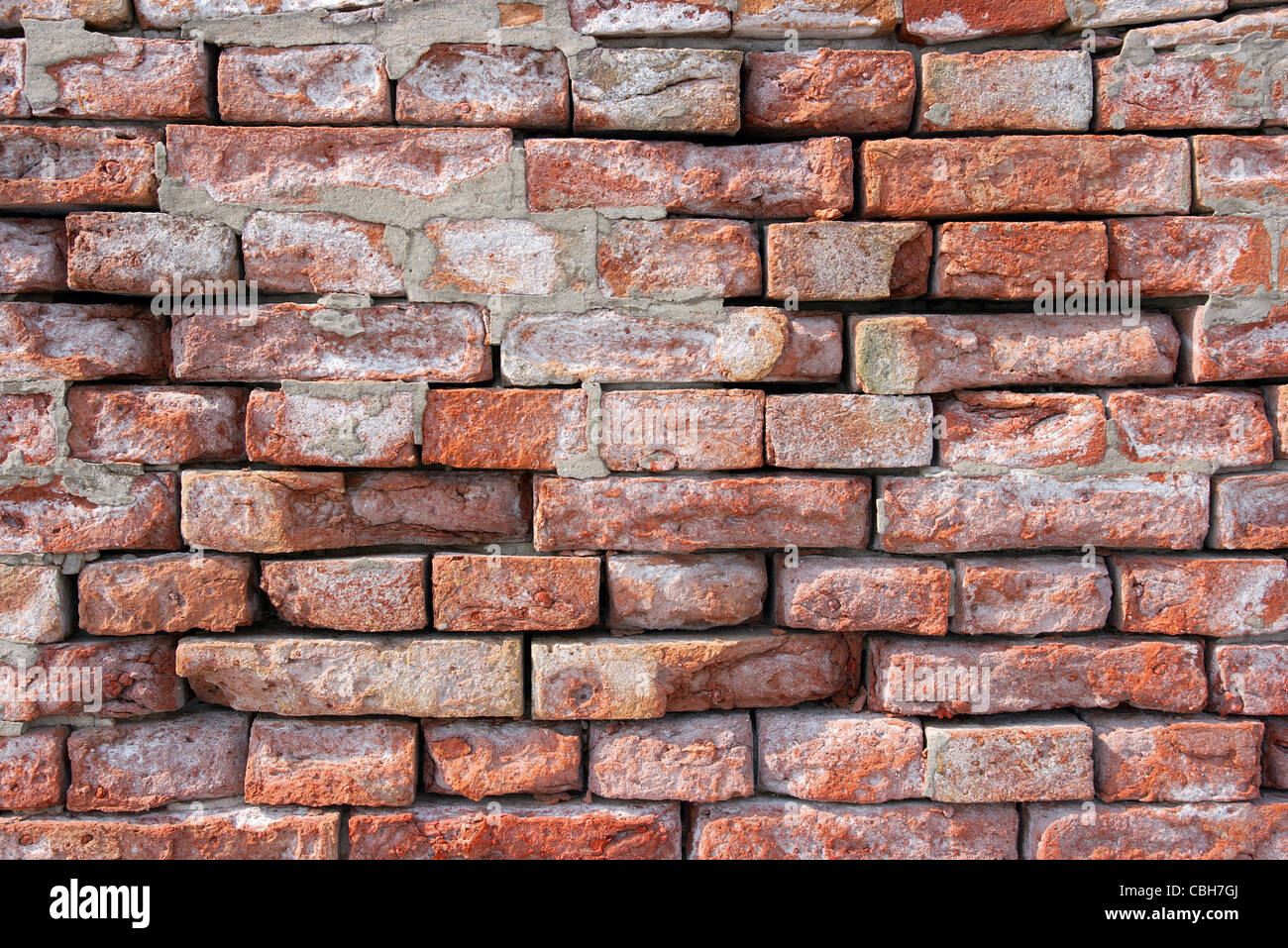 Wall of small reddish bricks Stock Photo - Alamy