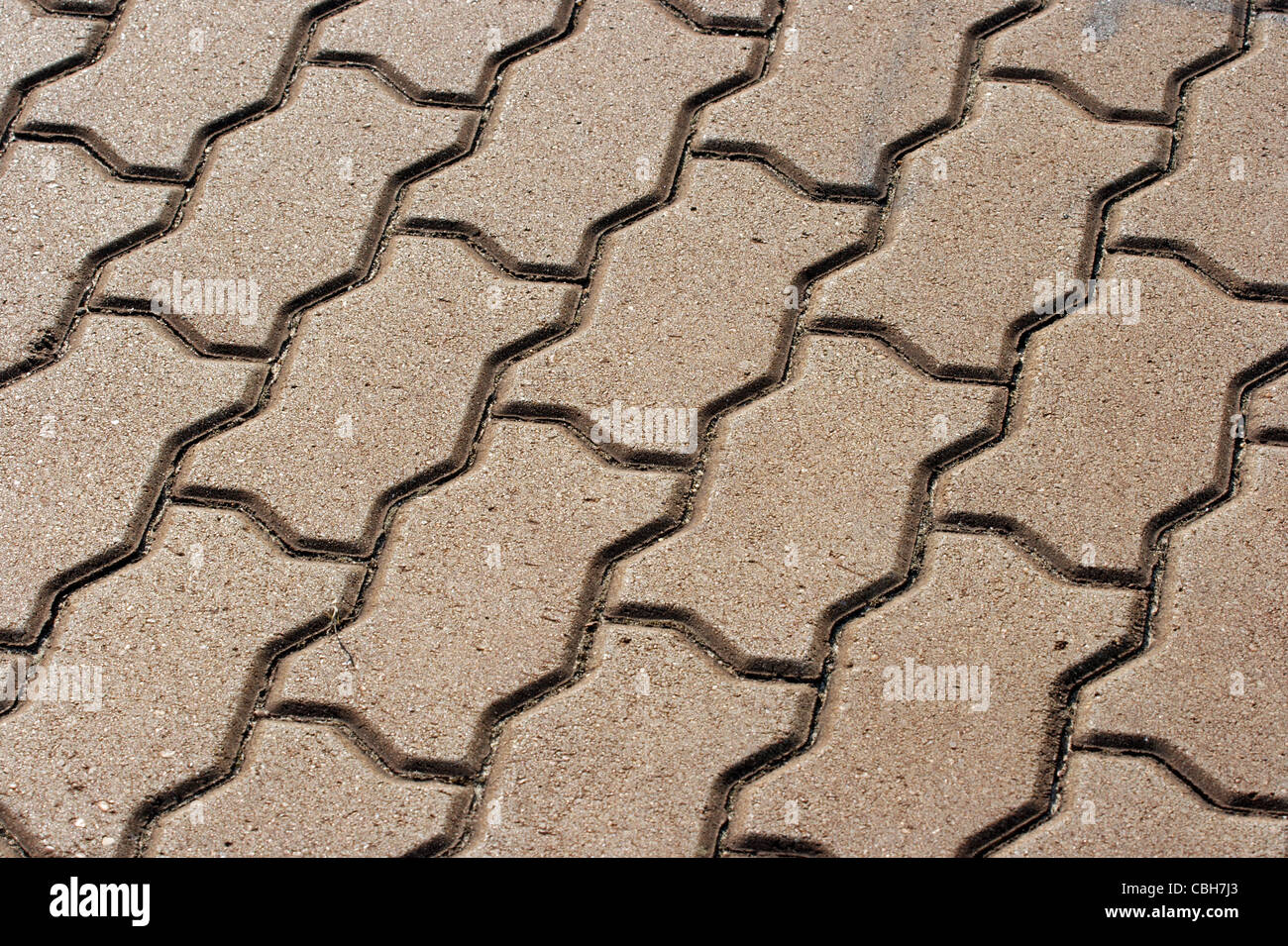 closeup of a pavement made of regular stones Stock Photo - Alamy