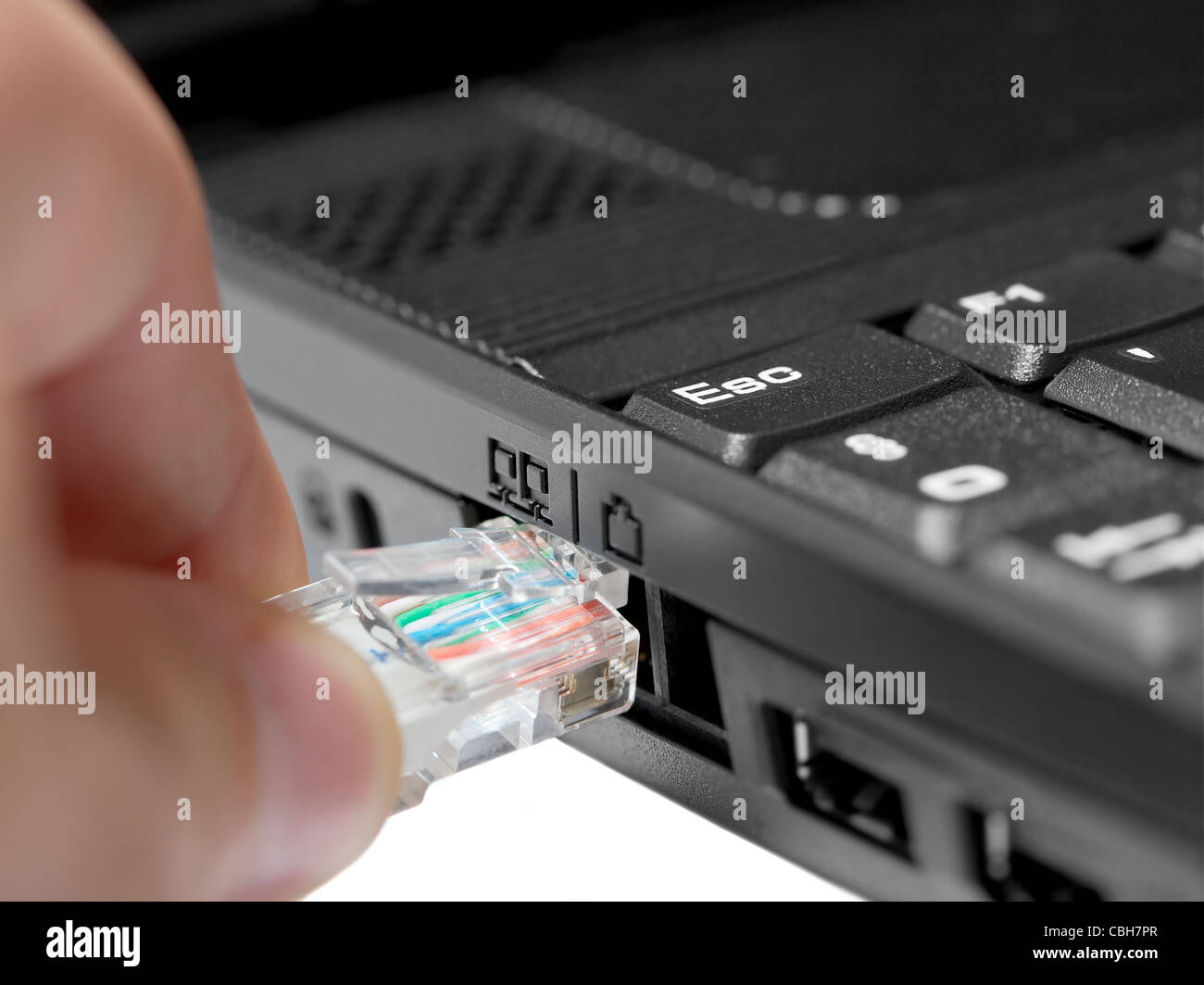 Close up hand plugging ethernet hi-res stock photography and images - Alamy