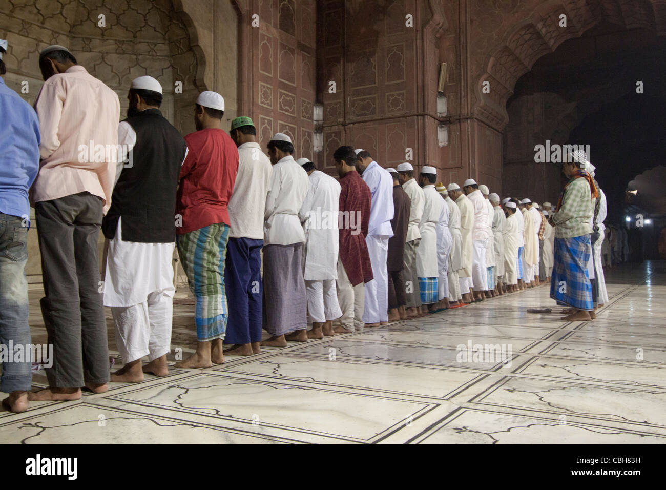 people standing for Namaz inside Jama masjid Delhi for morning prayers ...