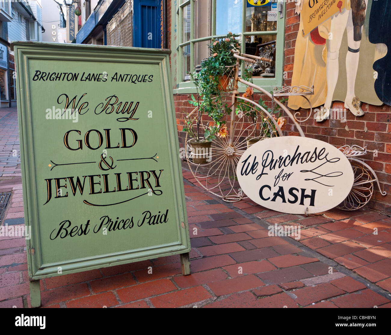 Sign outside Brighton Lanes antique shop offering cash for gold and ...
