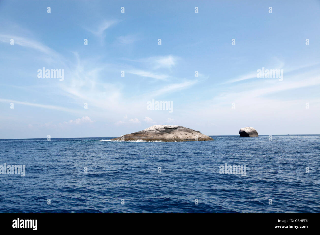 Seascape with small rocks and islands in the Similan Islands group ...