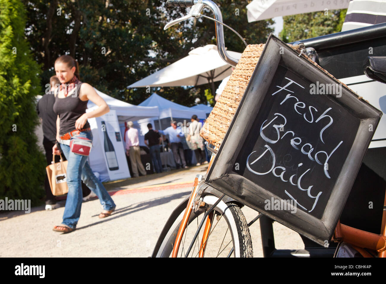 French bread sign in basket on bicycle at a French festival in ...