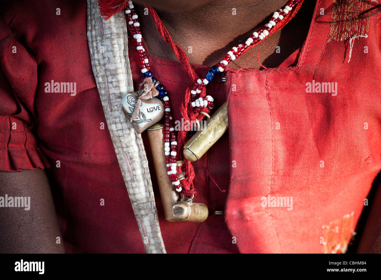 Poor Hindu Indian beggar girls clothing and necklace capsules ...