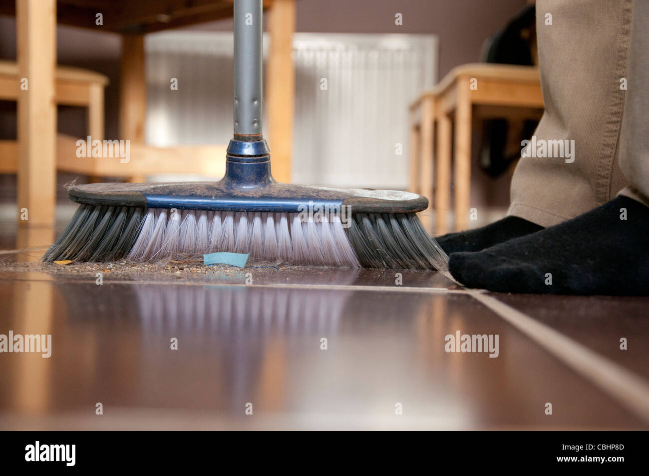 Broom sweeping floor hi-res stock photography and images - Alamy