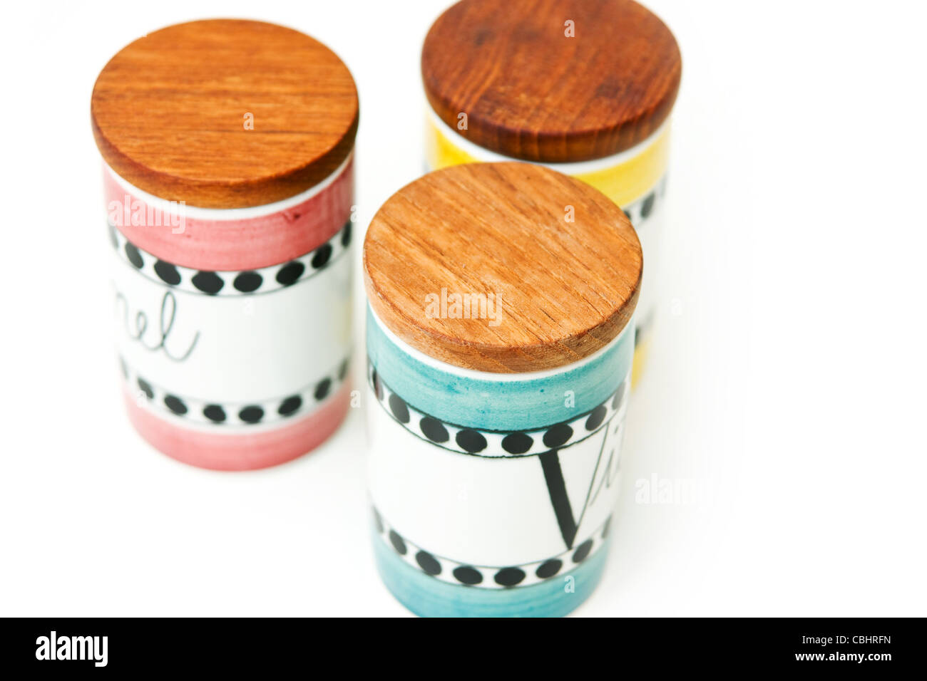 Spice containers in wood Stock Photo - Alamy