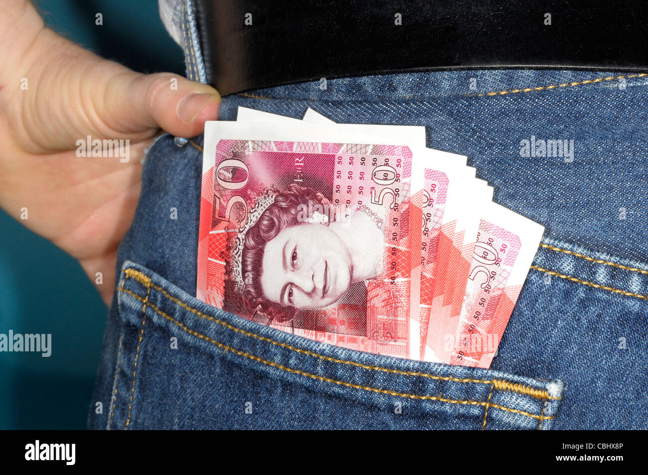 Pocket full of £50 bank notes Stock Photo - Alamy