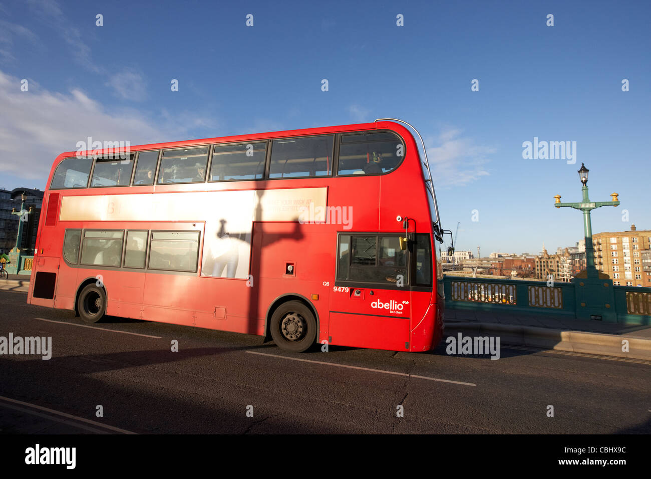 london red double decker bus public transport crossing southwark bridge ...