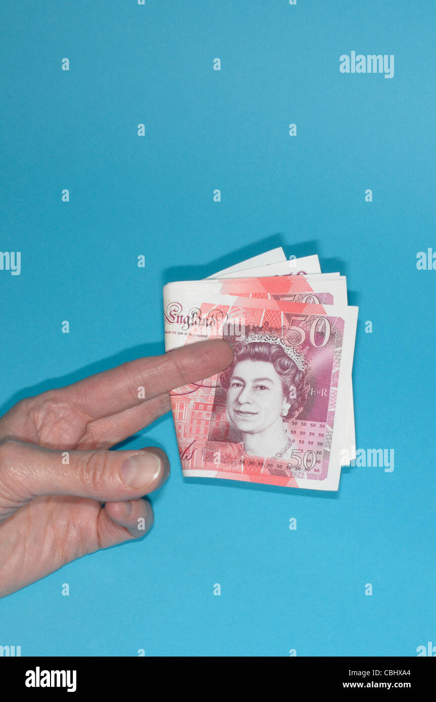 Hand Holding Fifty Pound Notes High Resolution Stock Photography and ...