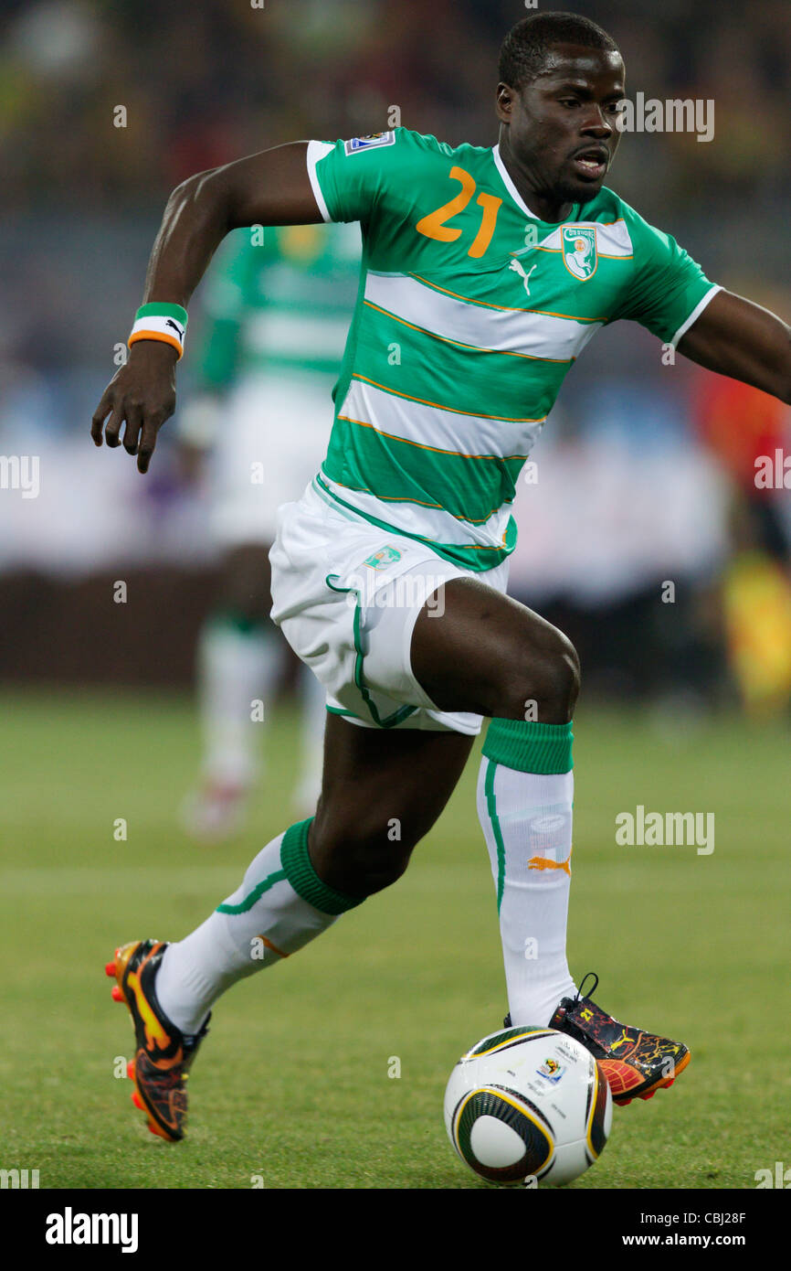 Emmanuel Eboue of Côte d'Ivoire controls the ball against Brazil during ...