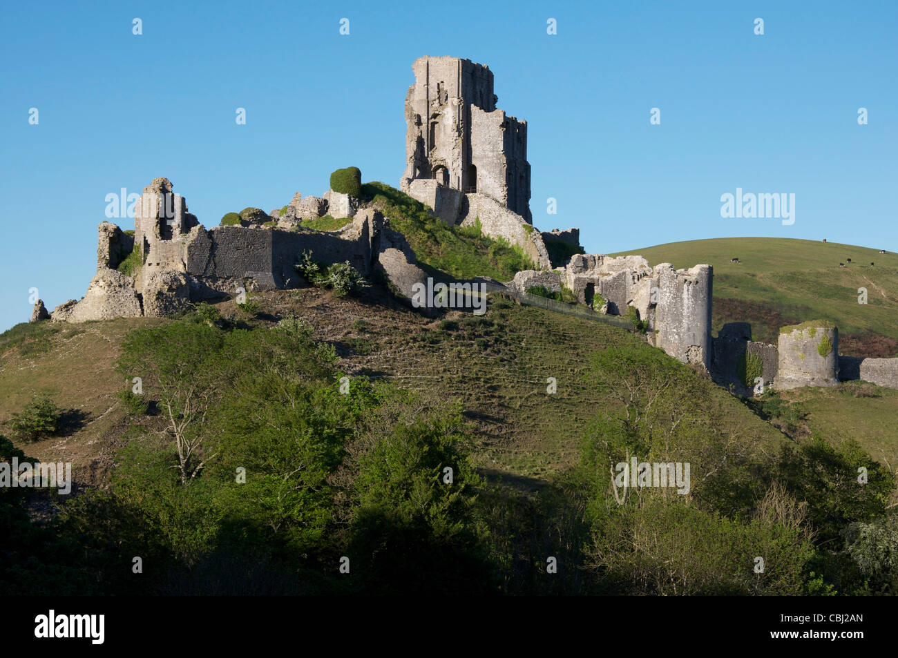 The great rugged ruins of an ancient Norman fortress dominate a ...