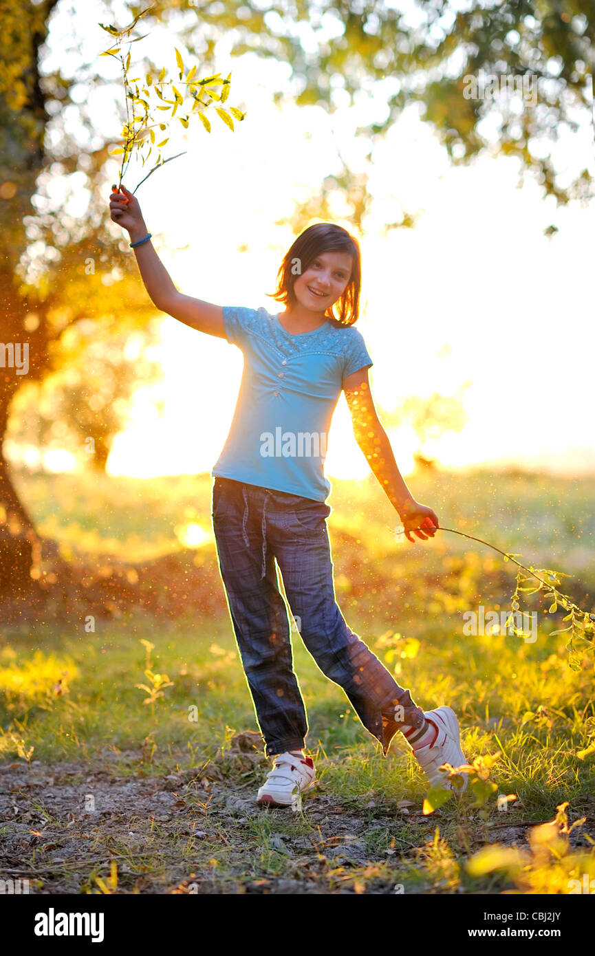 girl play against the sun Stock Photo - Alamy