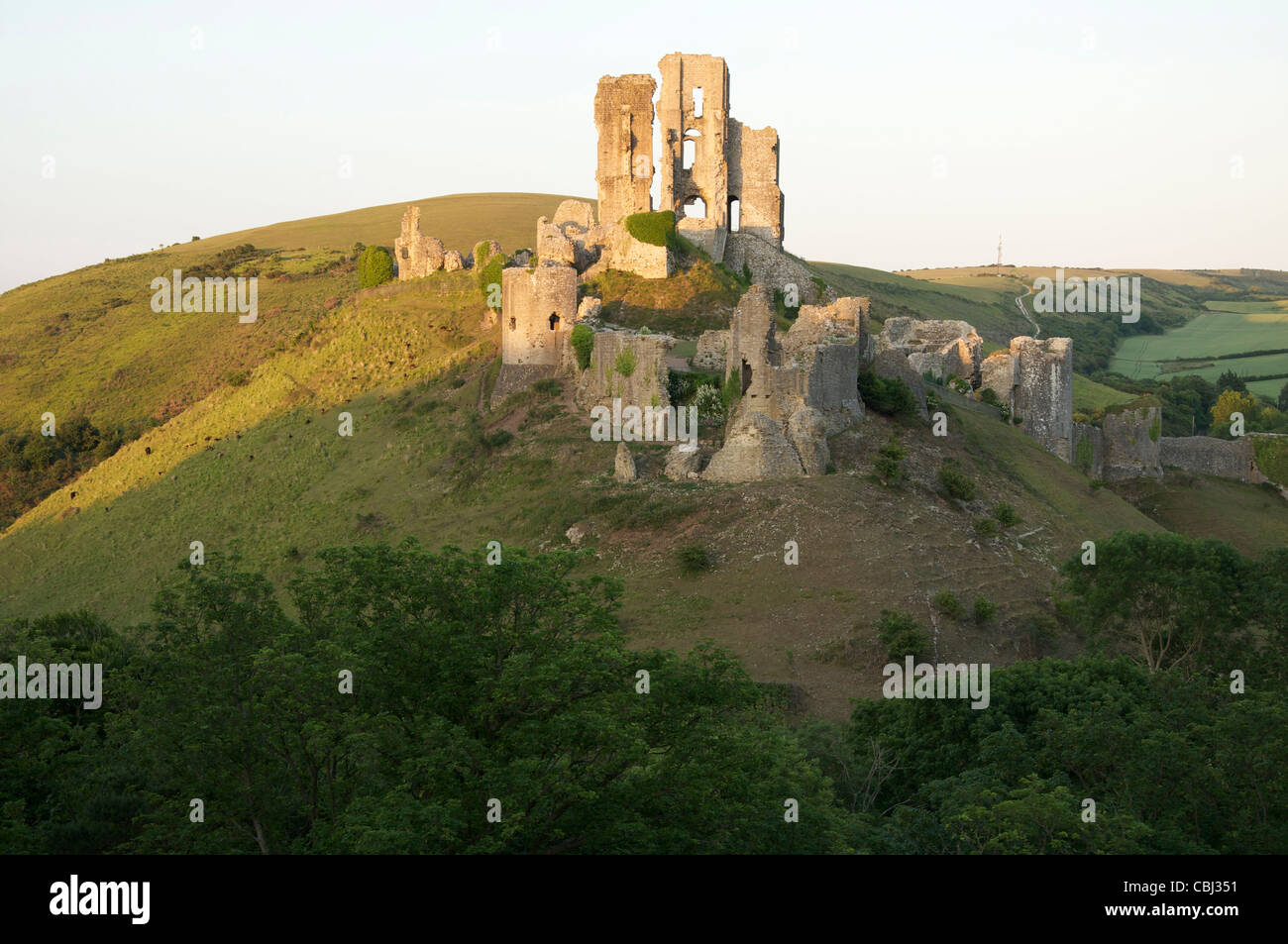 The great rugged ruins of an ancient Norman fortress dominate a ...