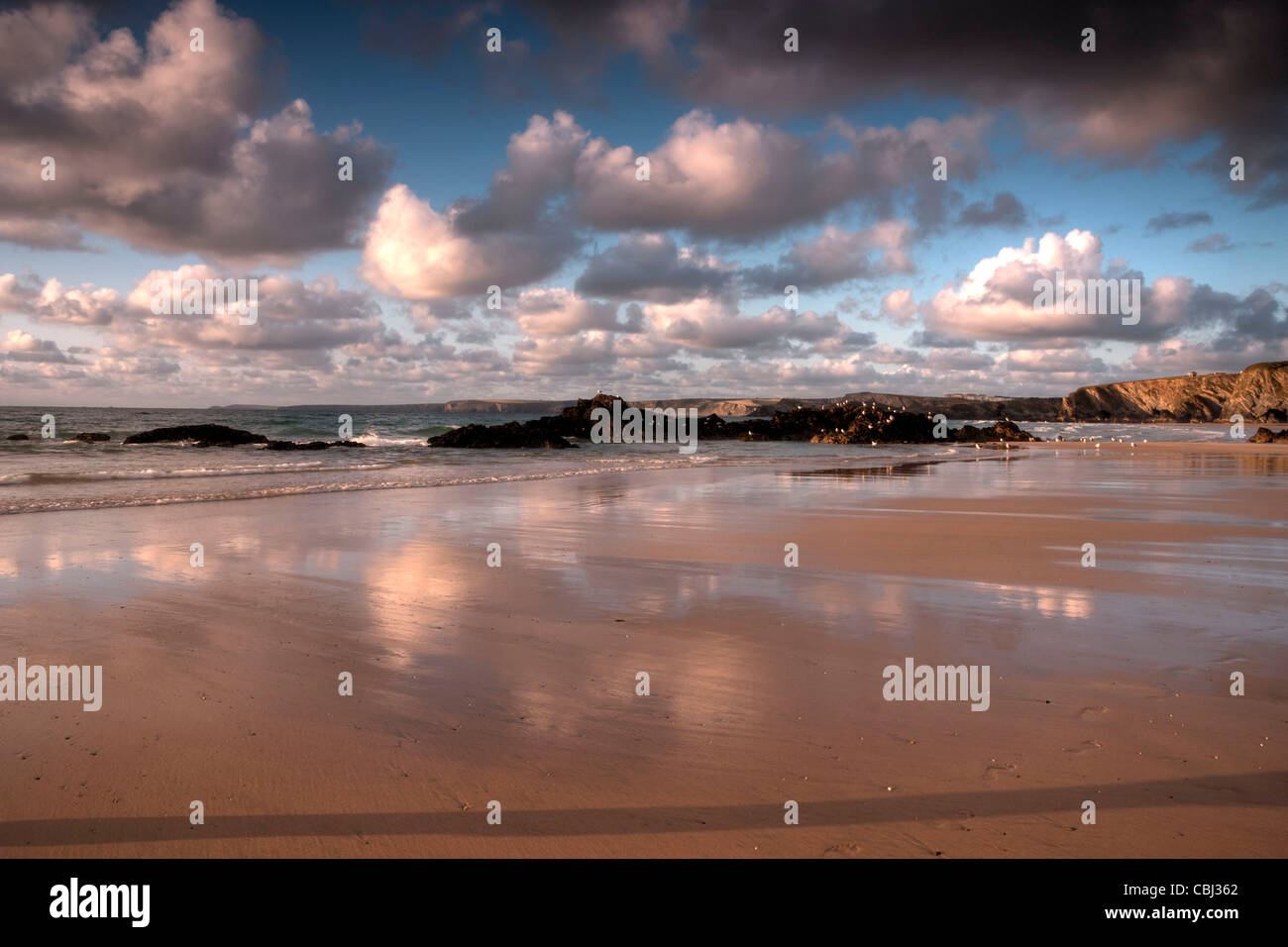 Reflections on beach sand Stock Photo - Alamy