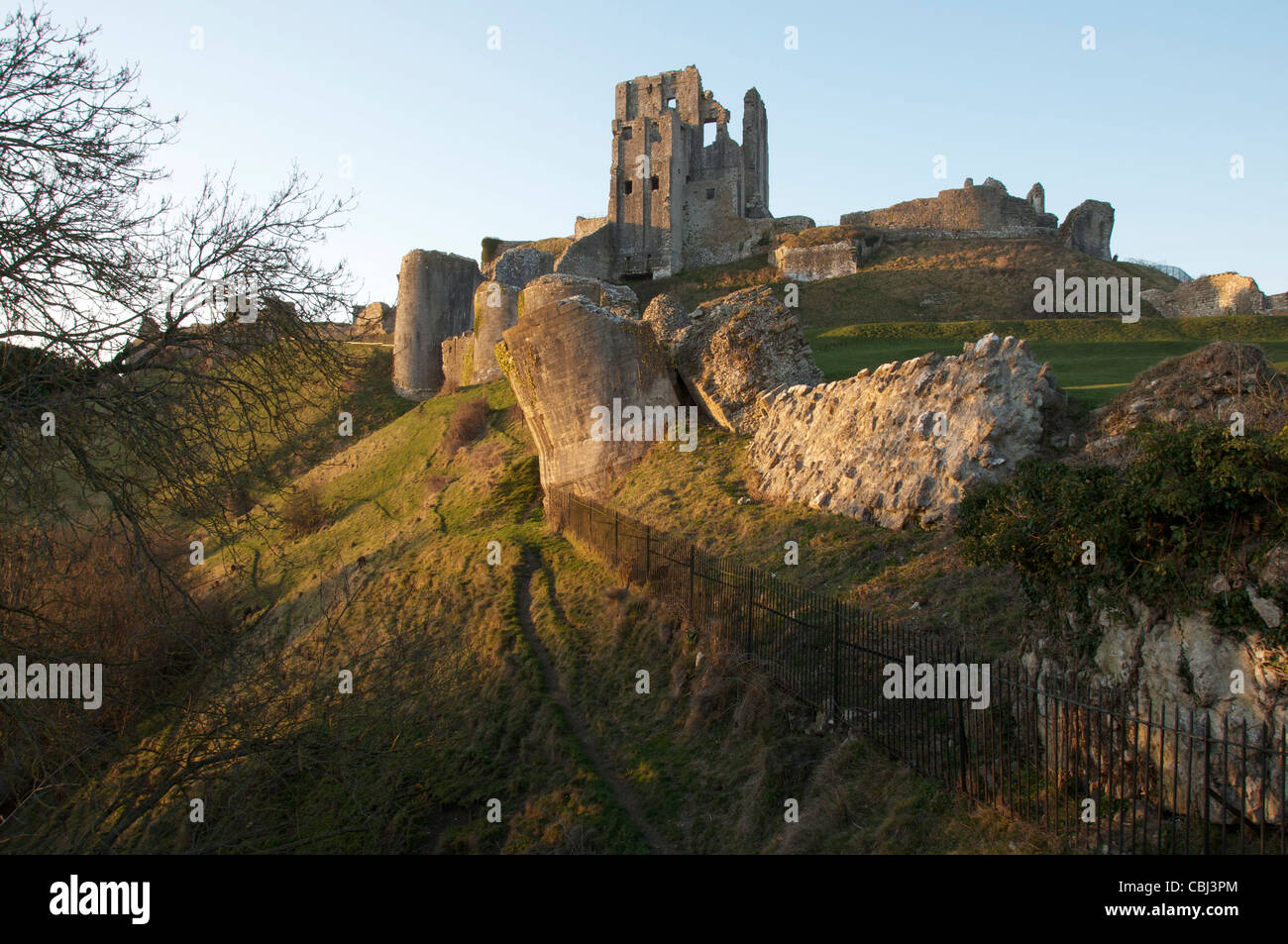 The great rugged ruins of Corfe Castle, with its broken down walls and ...