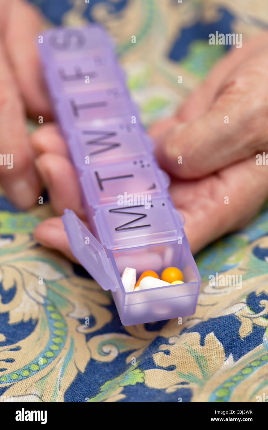 Hand with pills Stock Photo - Alamy