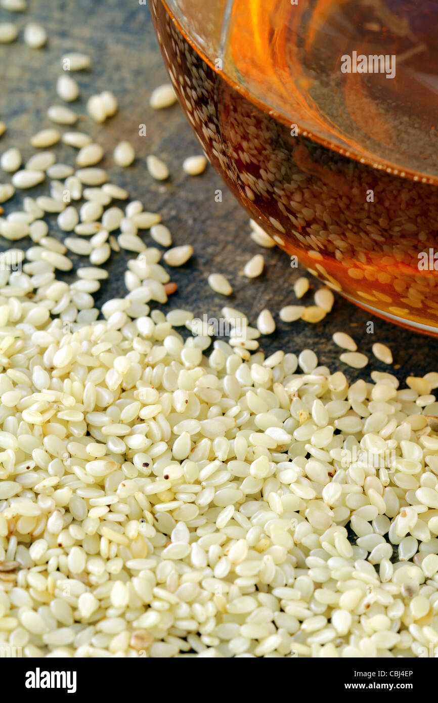 sesame seeds and sesame oil in a bottle Stock Photo - Alamy