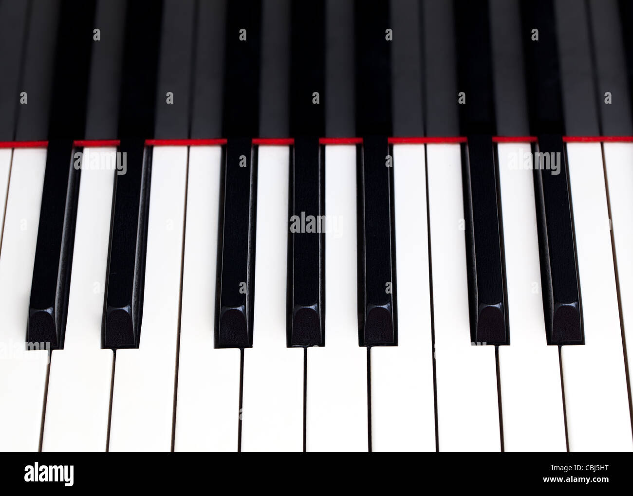 Close up image of the keys of a grand piano Stock Photo - Alamy