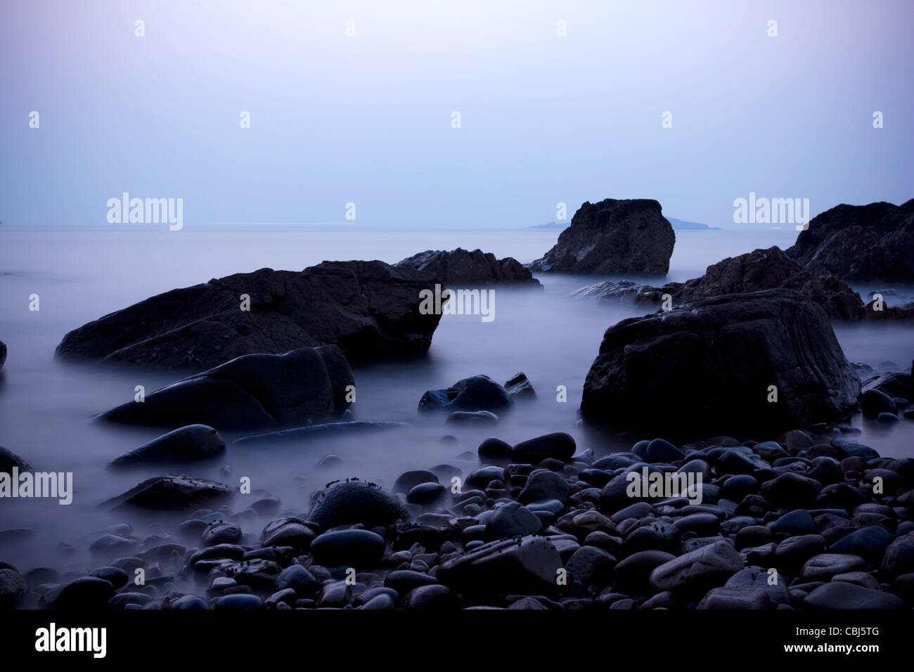 Sea mist beach sunrise Stock Photo - Alamy