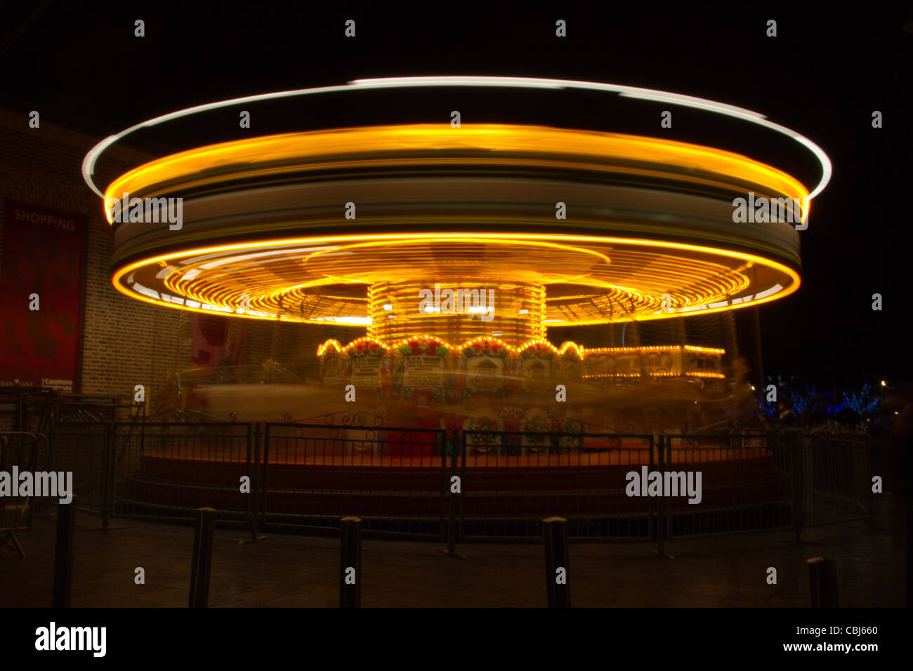 Carousel in motion at night Dublin, Ireland Stock Photo - Alamy