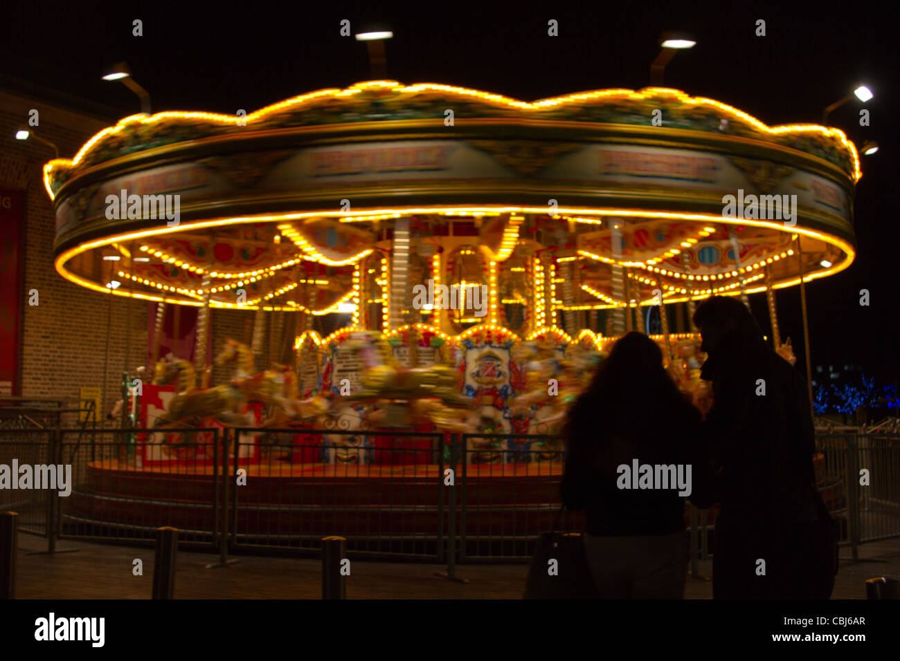 Carousel in motion at night Dublin, Ireland Stock Photo - Alamy