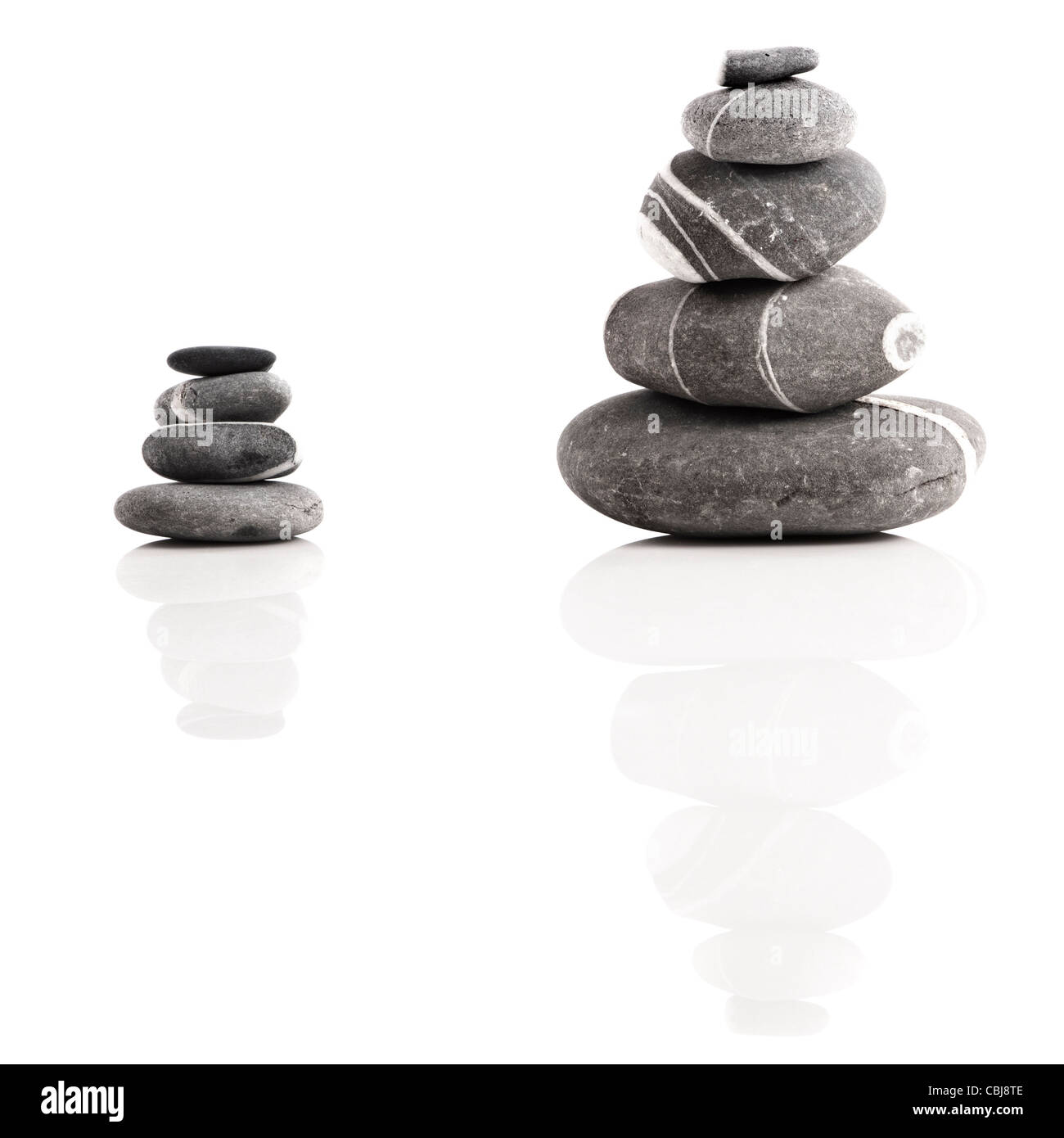 Stones pyramid isolated on white background with reflection Stock Photo ...