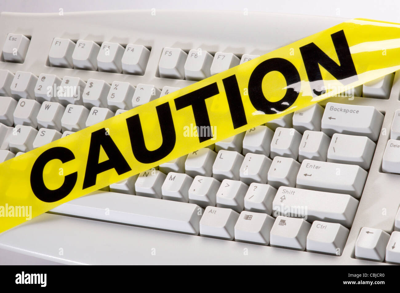 Caution tap on keyboard Stock Photo - Alamy