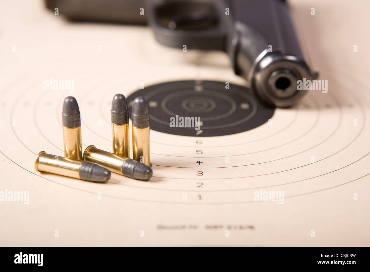 Target bullets and pistol Stock Photo - Alamy
