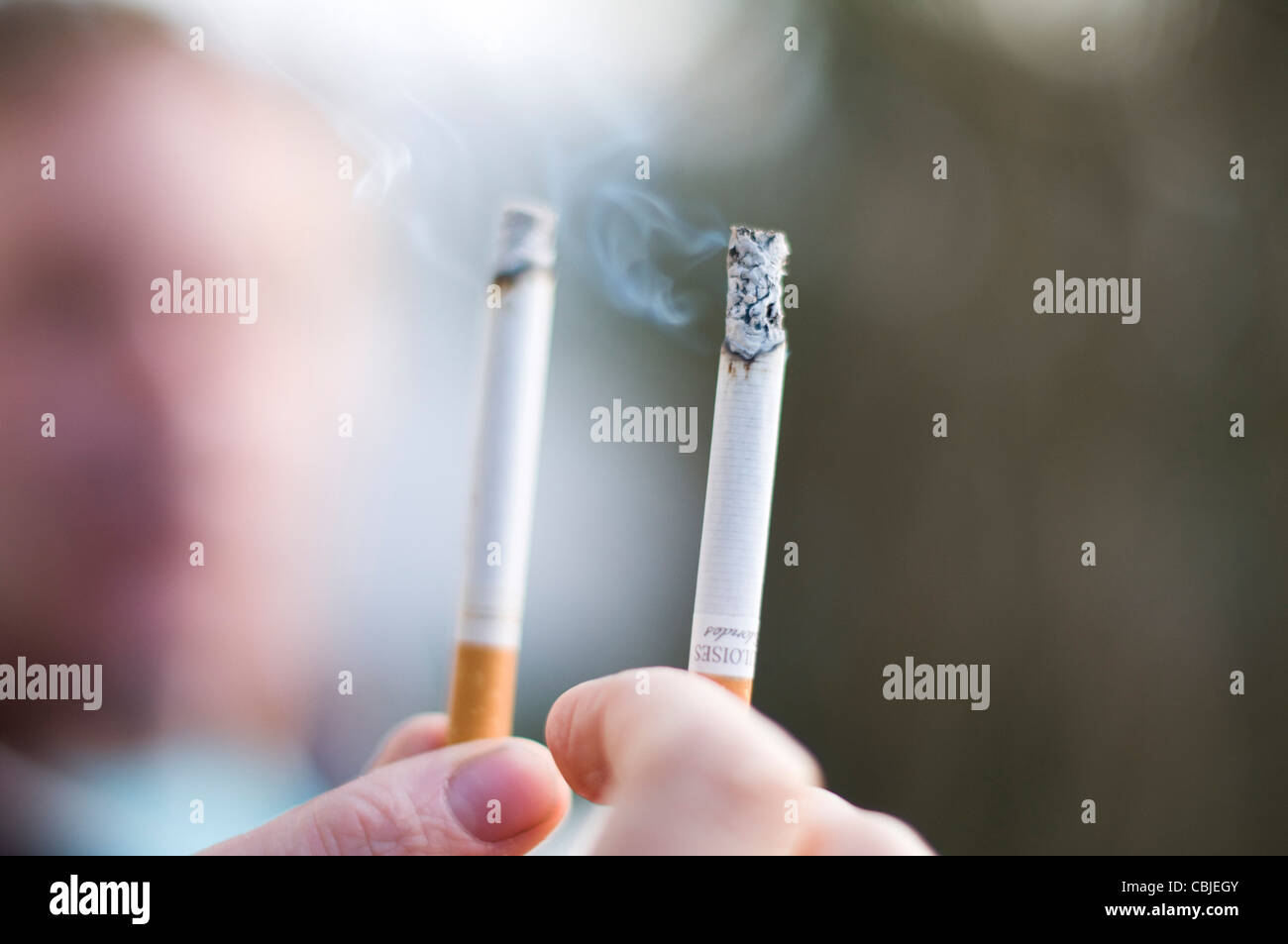 Two cigarettes hi-res stock photography and images - Alamy