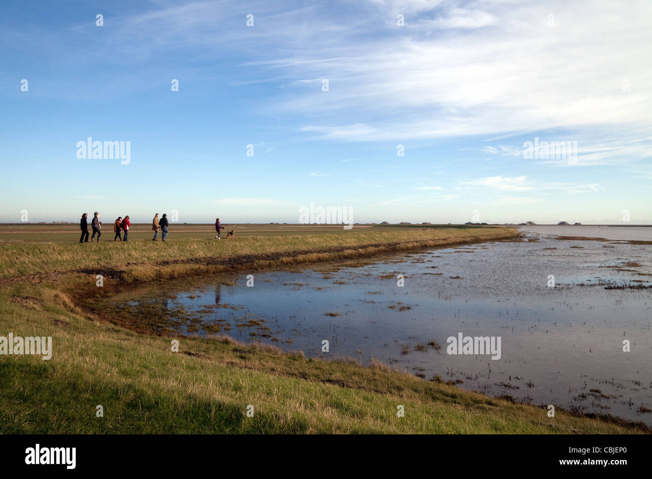 People walking the Suffolk Coastal path at Orford, Suffolk UK Stock ...
