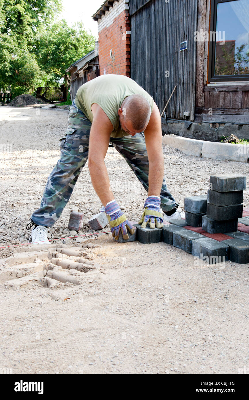 Pave person hi-res stock photography and images - Alamy