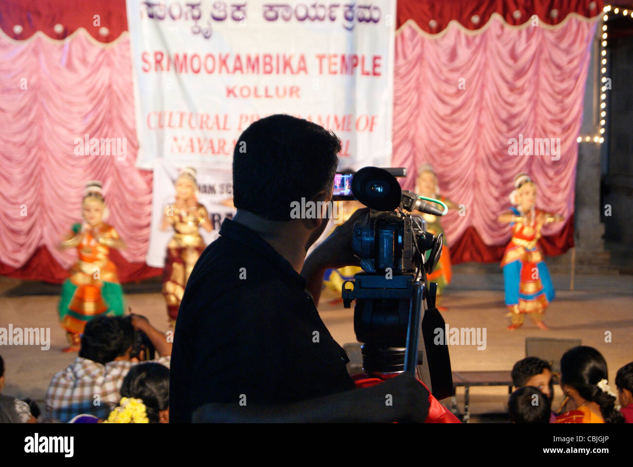 Cameraman Covering cultural dance Program in Temple Stock Photo - Alamy
