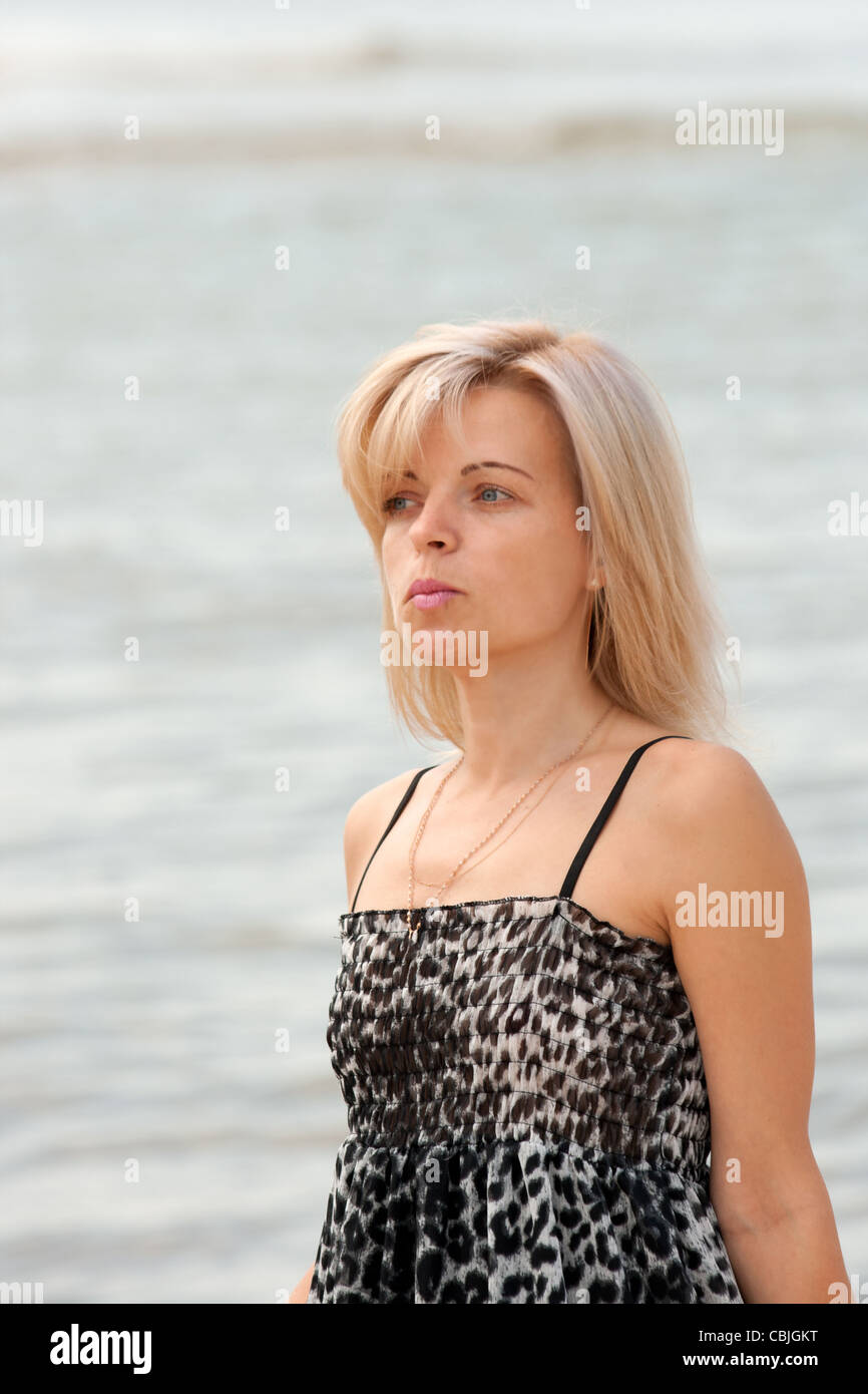 Beautiful woman on the beach Stock Photo - Alamy